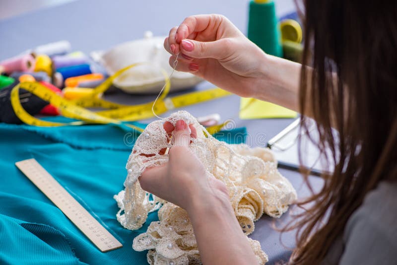 Woman Tailor Working on a Clothing Sewing Stitching Measuring Fa Stock ...