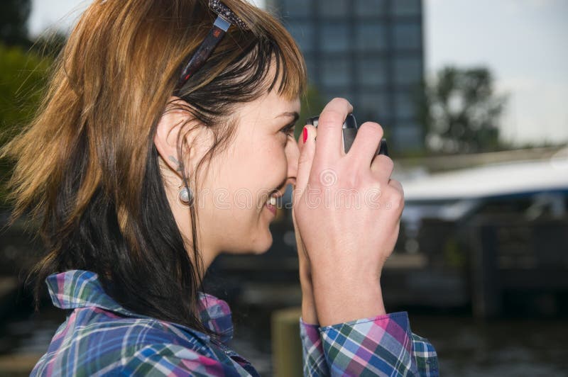 Woman take a camera shot stock image. Image of digital - 25811293