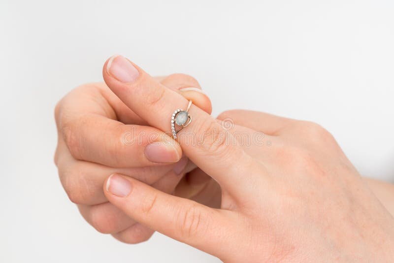 Woman Take Off Wedding Ring Stock Image - Image of finished, hand ...