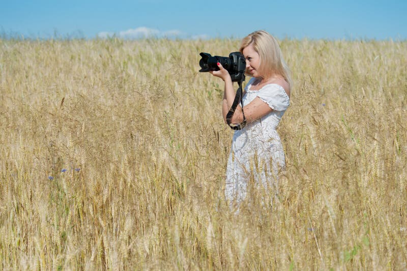 Woman Take a Photo with Camera in a Field Stock Photo - Image of cute ...