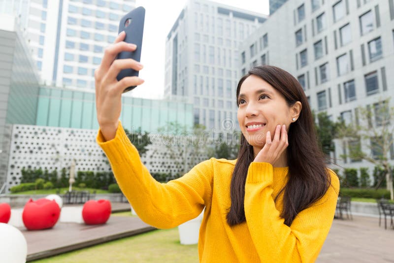 Woman take selfie by phone stock photo. Image of cell - 64868308