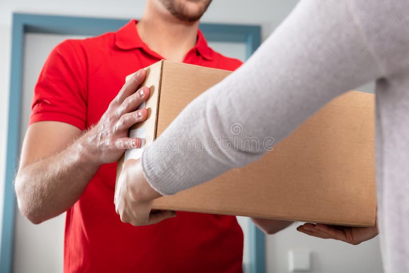Woman Taking Box from Delivery Man Stock Image - Image of package ...