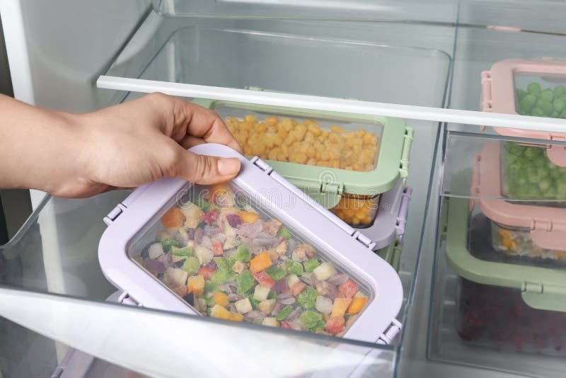 Woman Taking Box with Mix from Refrigerator, Closeup Stock Photo ...