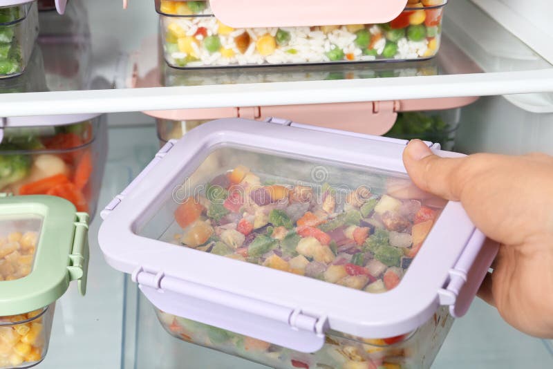 Woman Taking Box with Mix from Refrigerator, Closeup Stock Photo ...