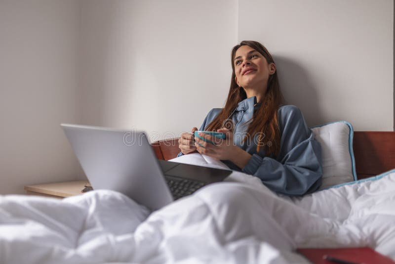 Woman Taking a Break while Working from Home in the Morning Stock Photo ...