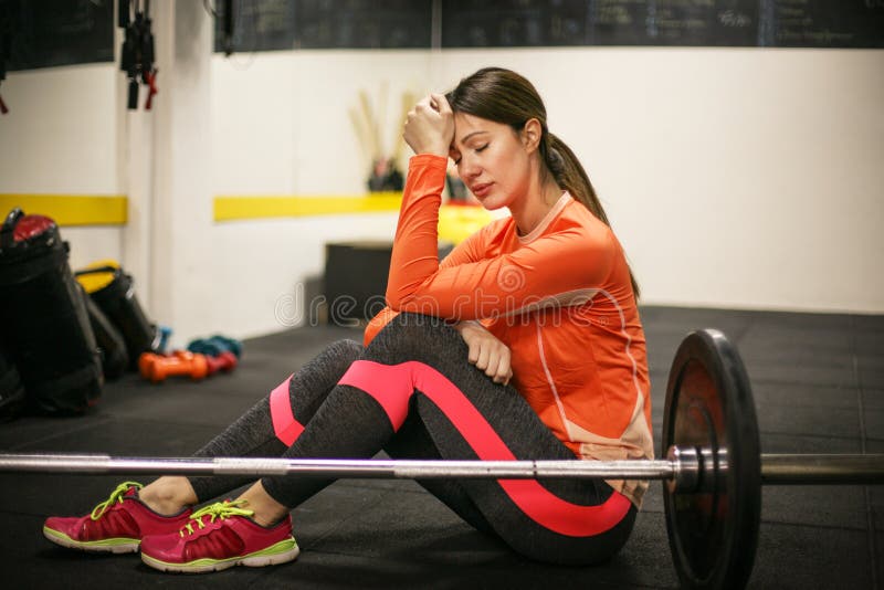 Woman Taking a Break while Working Out. Stock Photo - Image of indoor ...