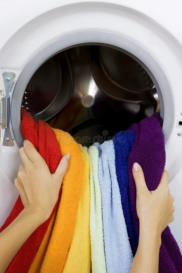Woman Taking Color Clothes from Washing Machine Stock Image - Image of ...