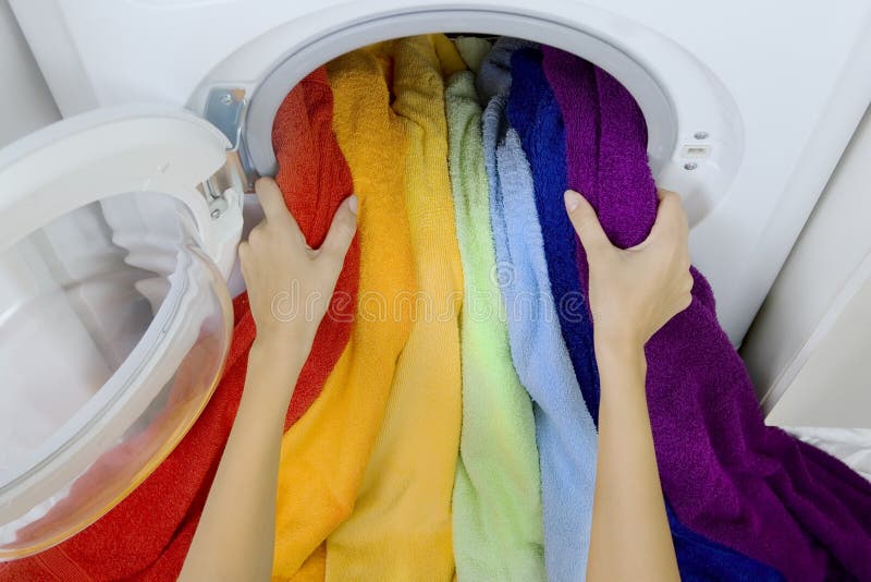 Woman Taking Color Clothes from Washing Machine Stock Image - Image of ...