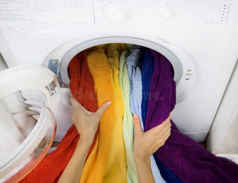 Woman Taking Color Laundry from Washing Machine Stock Image - Image of ...