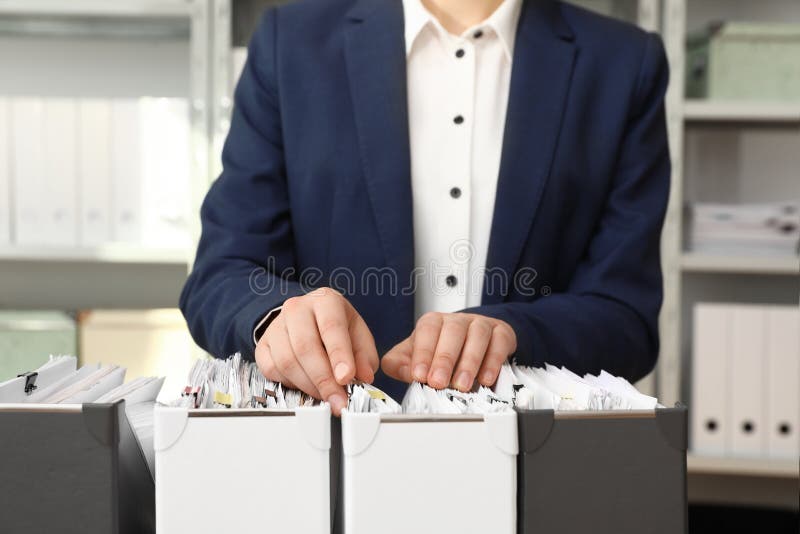 Woman Taking Documents from Folder in Archive Stock Image - Image of ...