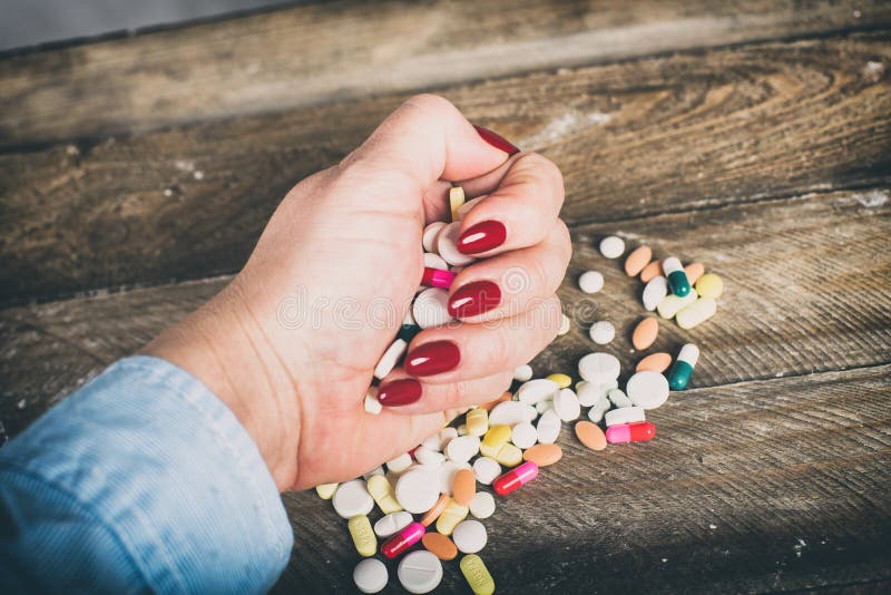 Woman taking drugs stock image. Image of rehab, overdosage - 85377329