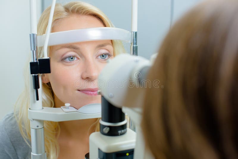 Woman taking eye test stock image. Image of ophthalmology - 100877459