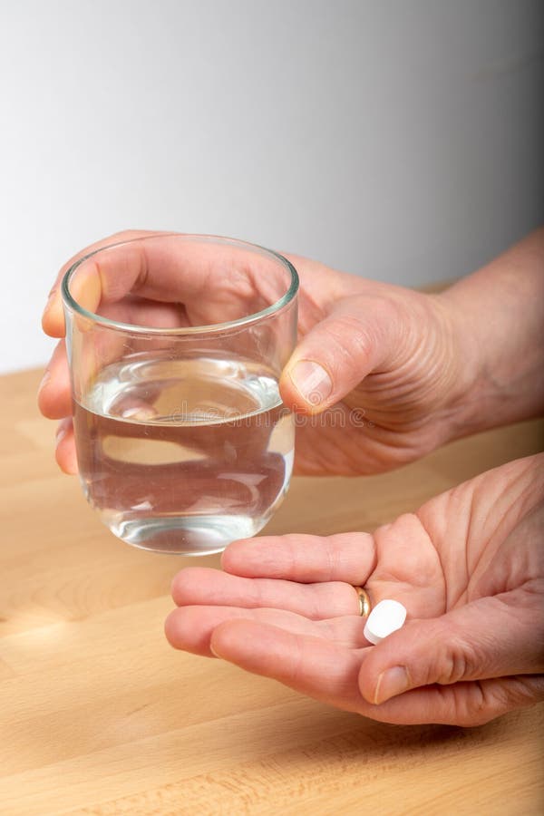 Woman taking medicine stock image. Image of medical - 170274653