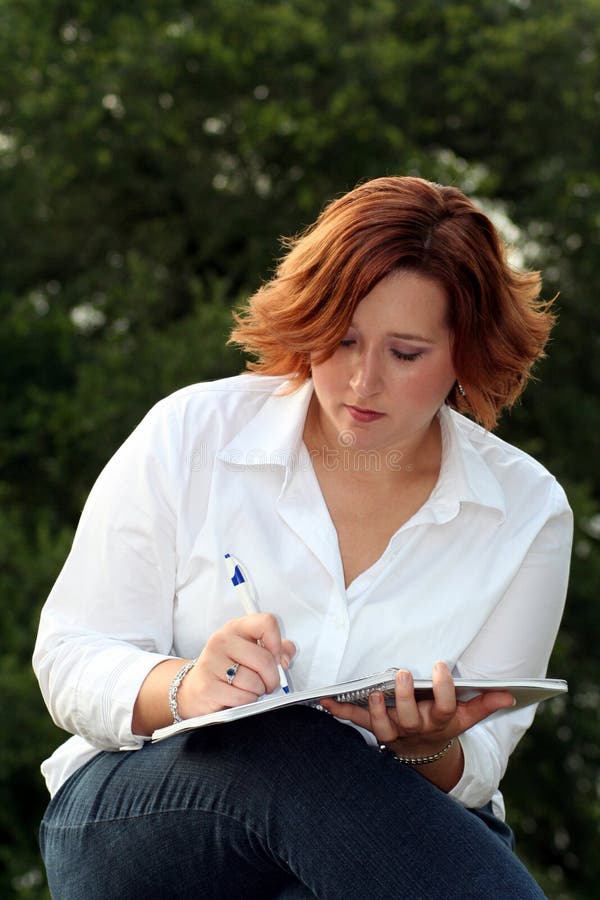 Woman taking notes stock photo. Image of pretty, notes - 222546