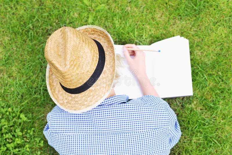 Woman Taking Notes on Grass Stock Photo - Image of education, book ...