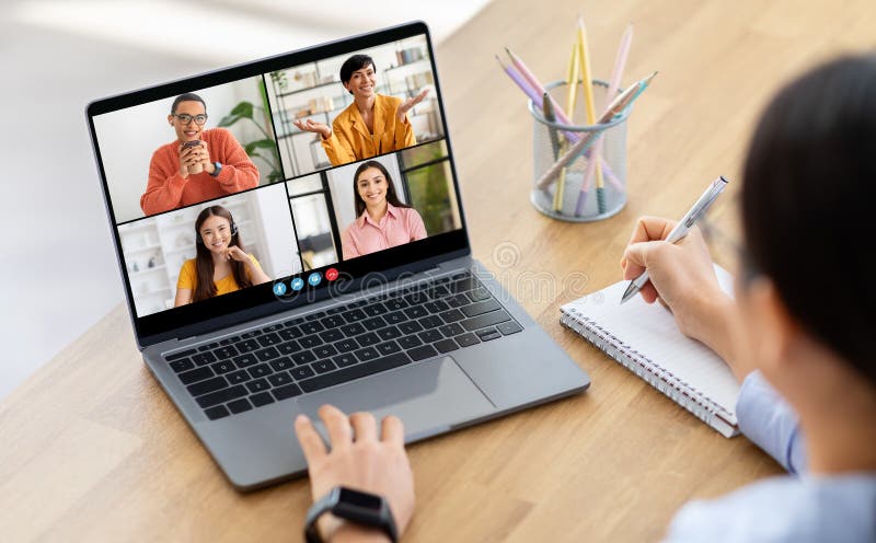 Woman Taking Notes during Online Video Conference Meeting Stock Photo ...