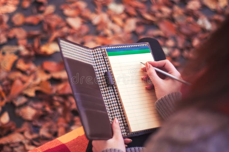 Woman Taking Notes in a Pad Stock Photo - Image of lifestyle, pencil ...