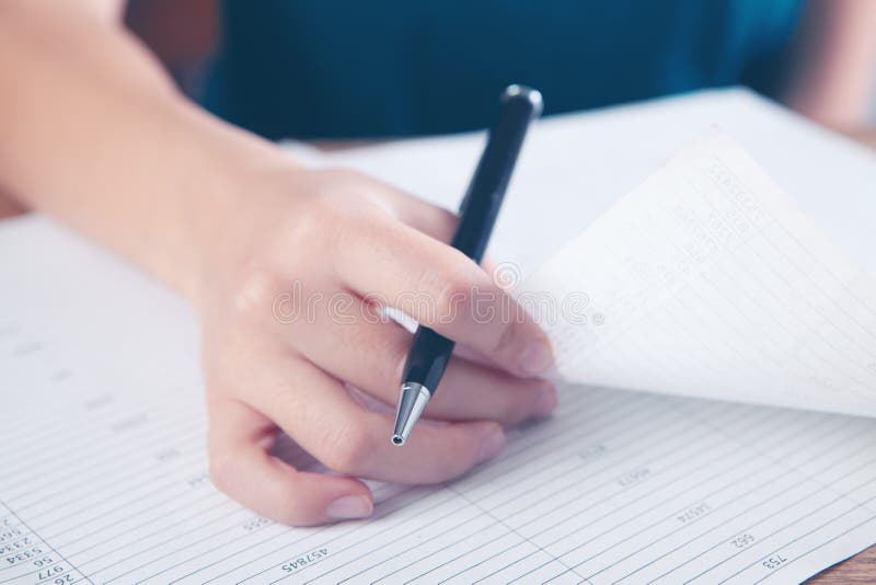 Woman Taking Notes in Papers Stock Image - Image of notes, filling ...