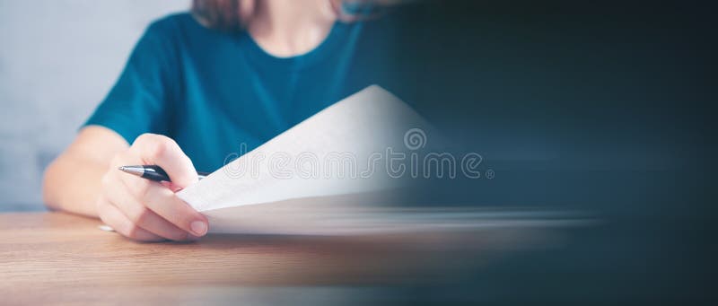 Woman Taking Notes in Papers Stock Photo - Image of paper, office ...