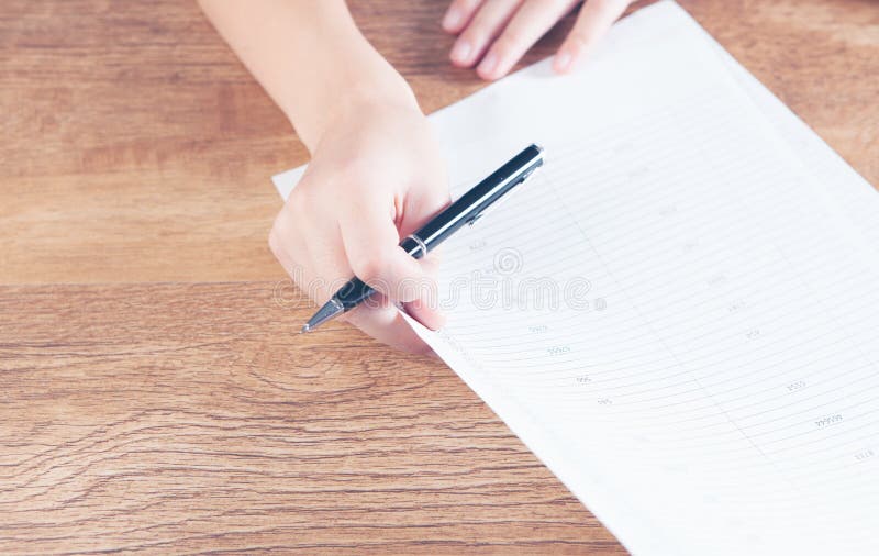 Woman Taking Notes in Papers Stock Image - Image of paper, student ...