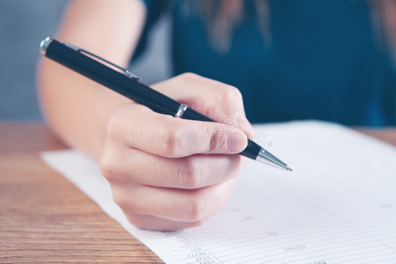 Woman Taking Notes in Papers Stock Image - Image of taking, studying ...