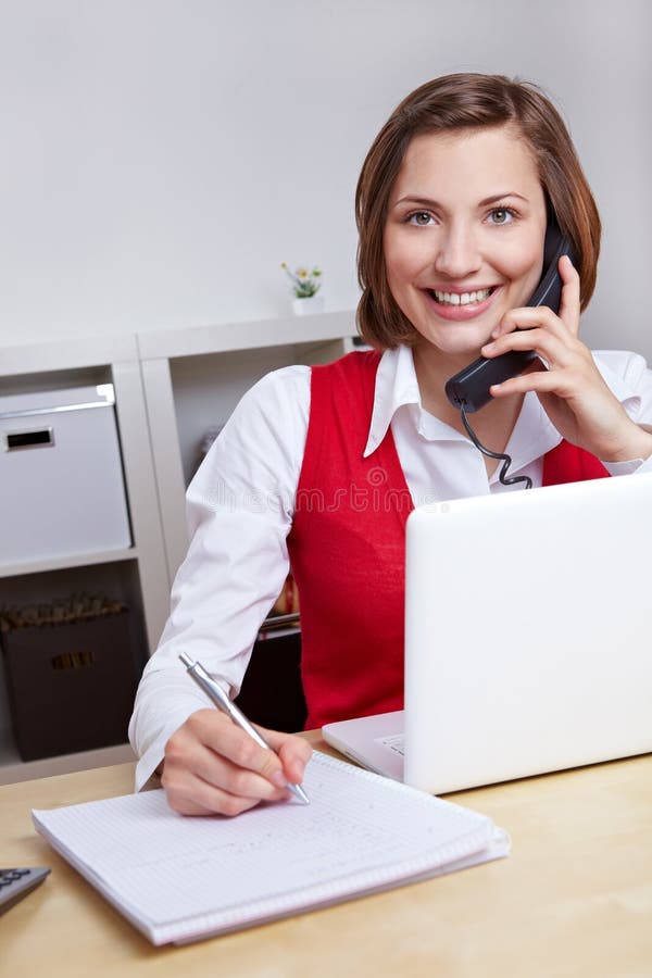 Woman Taking Notes during a Phone Call Stock Image - Image of employee ...