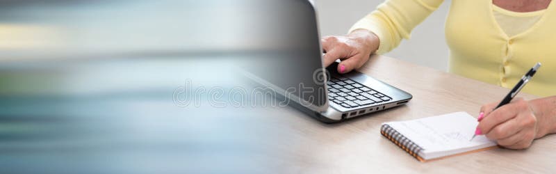 Woman Taking Notes and Typing on Laptop Stock Image - Image of write ...