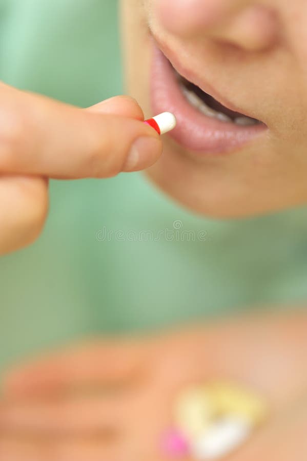 Woman taking pills stock image. Image of prescribe, girl - 15058243