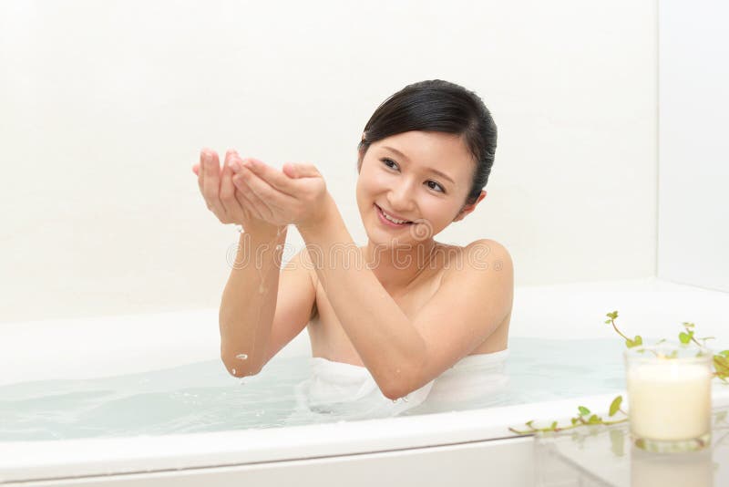 Woman taking relaxing bath stock image. Image of enjoying - 134361933