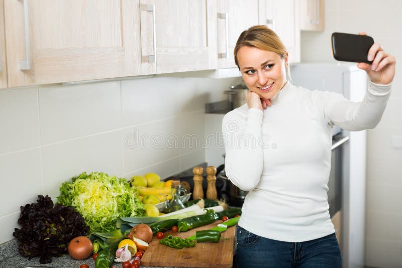 Woman Taking Selfie at Home Stock Image - Image of emotional, lettuce ...