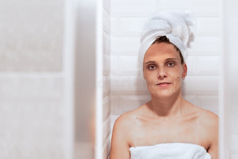 Woman after Taking a Shower Smiling and Looking at Camera. Stock Image ...