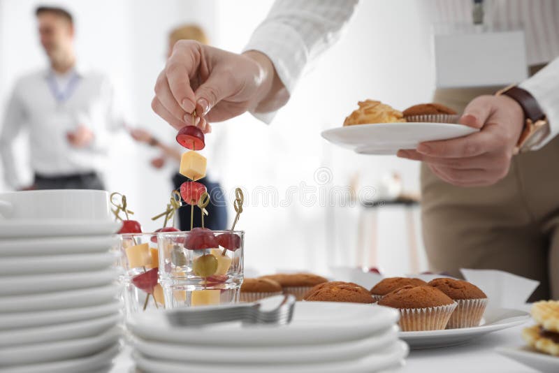 Woman Taking Snack during Coffee Break Stock Photo - Image of coffee ...