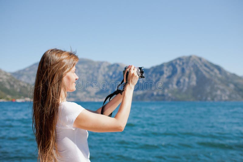 Woman taking snapshot stock image. Image of occupation - 27751897