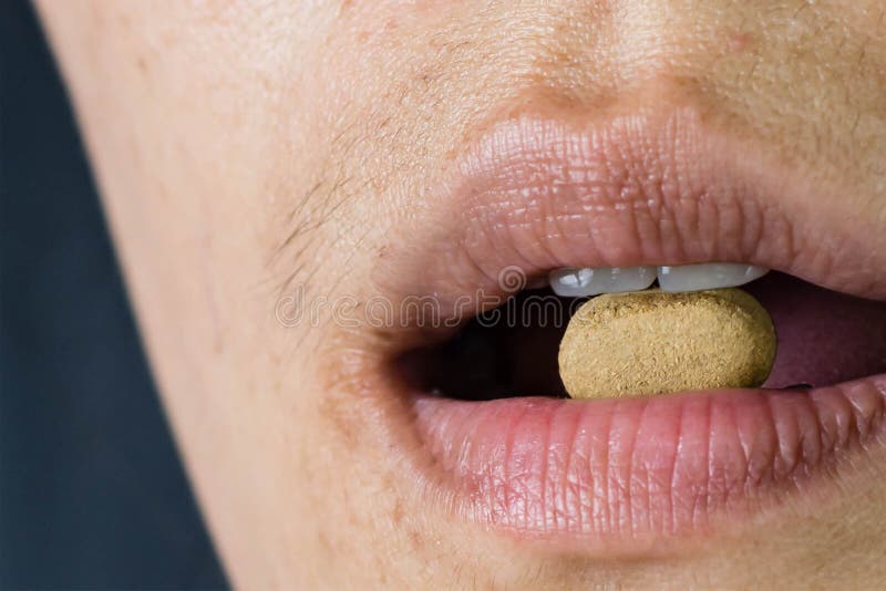 Woman Taking a Tablet. Close Up Face with a Pill Stock Image - Image of ...