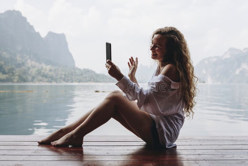 Woman Taking a Video of Herself Stock Image - Image of phone, natural ...
