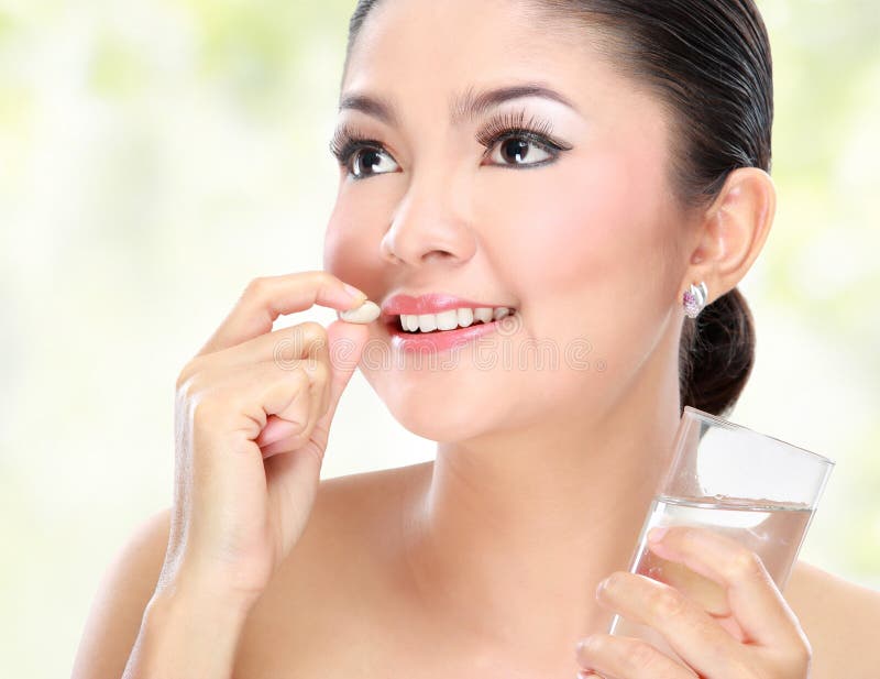 Woman Taking Vitamin Tablet Stock Image - Image of health, aqua: 27603455 Woman Taking Vitamin Tablet Stock Image - Image of health, aqua: 27603455