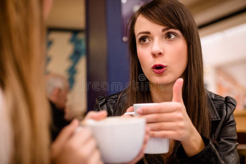 Woman Talking while Having Coffee Stock Photo - Image of female ...