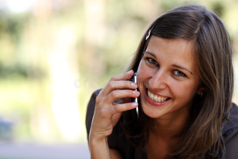 Woman Talking on Mobile Phone Stock Photo - Image of closeup, female ...