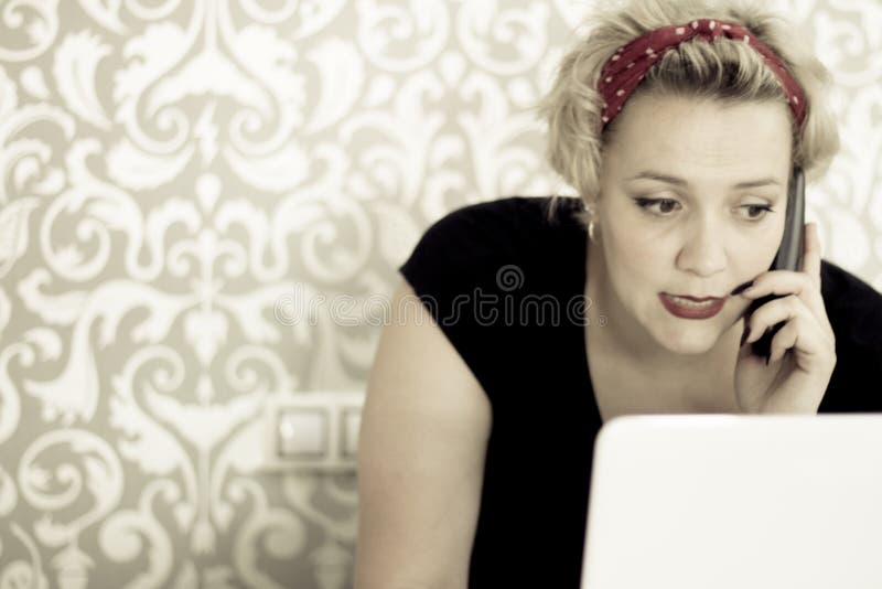 Woman Talking on the Phone with a Computer Stock Image - Image of ...