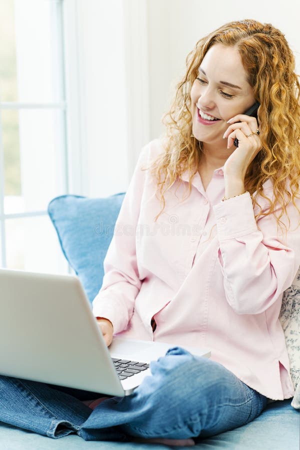 Woman Talking on Phone and Using Computer Stock Image - Image of ...