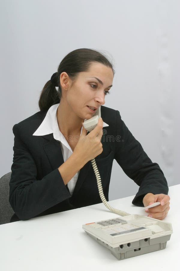 Woman Talking on Telephone stock photo. Image of office - 1314172