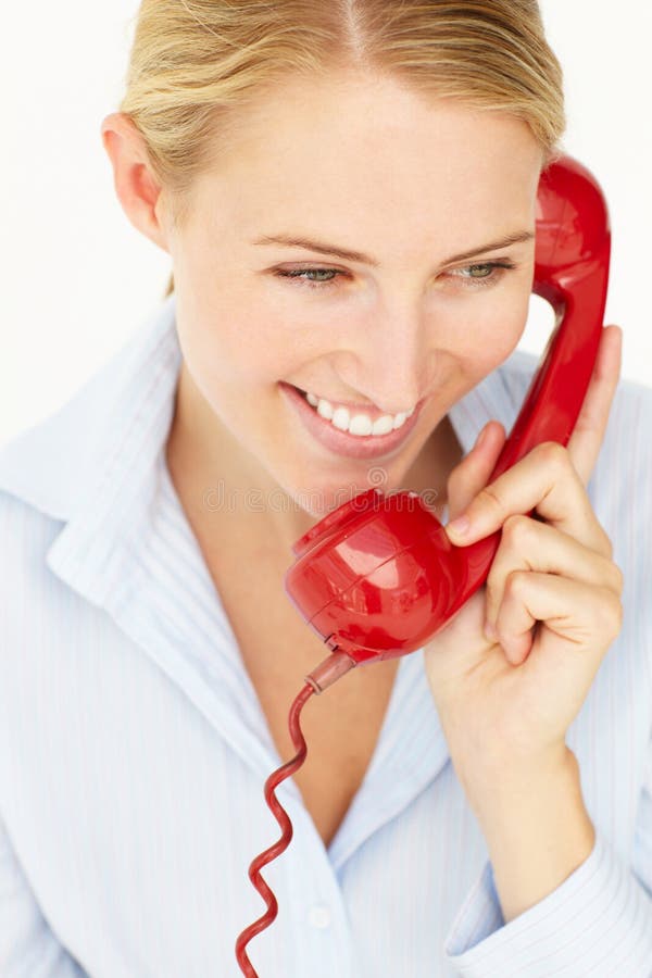 Woman talking on telephone stock photo. Image of office - 19906866