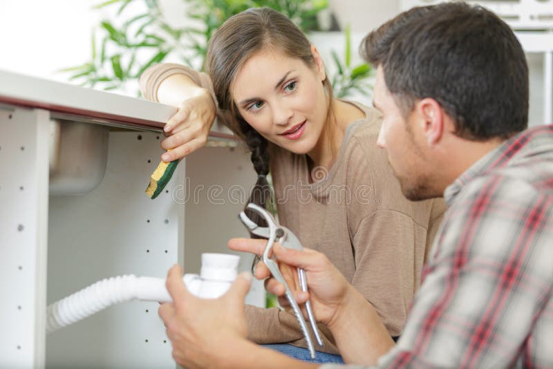Plumber Worker Talking To Client Stock Photos - Free & Royalty-Free ...