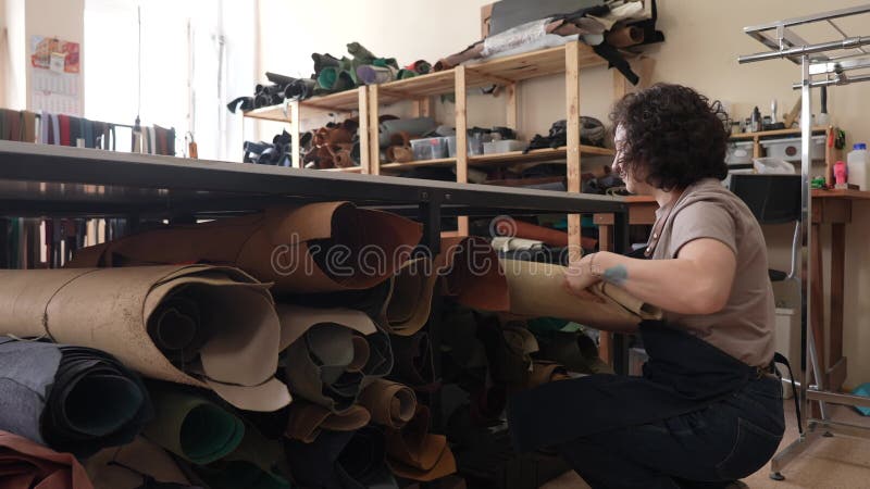 Woman Tanner at Work in the Workshop. Stock Footage - Video of clothing ...