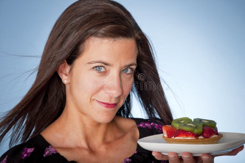 Woman with tart stock image. Image of brunette, food - 19995775