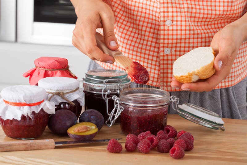 Woman tasting fresh jam stock photo. Image of juicy, plum - 36956086