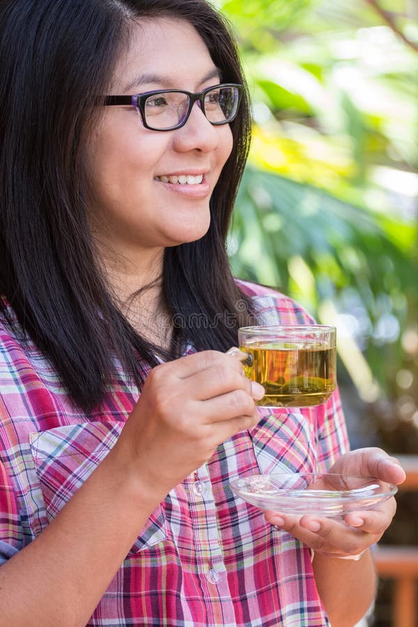 Woman and tea stock image. Image of break, relax, happy - 32717081