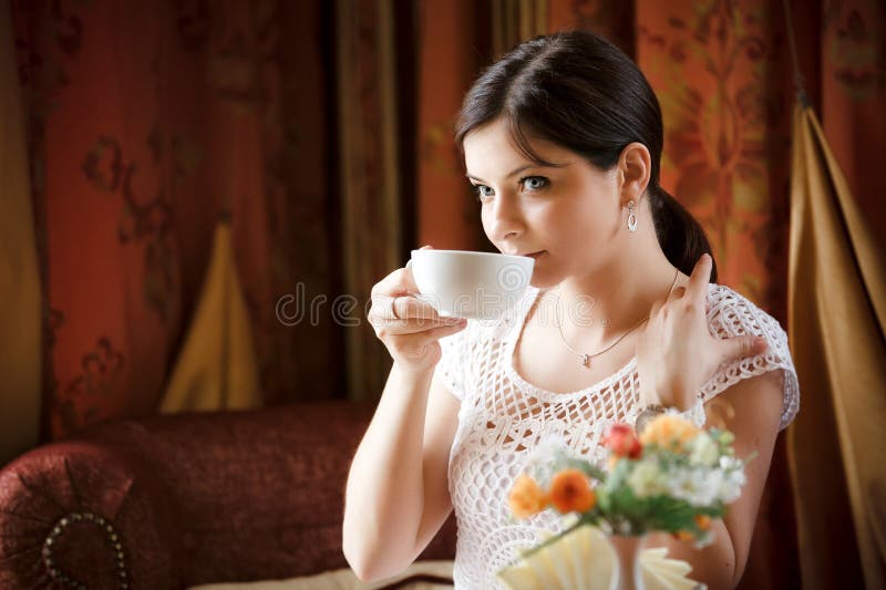 Woman in coffee shop stock photo. Image of young, enjoy - 12979850