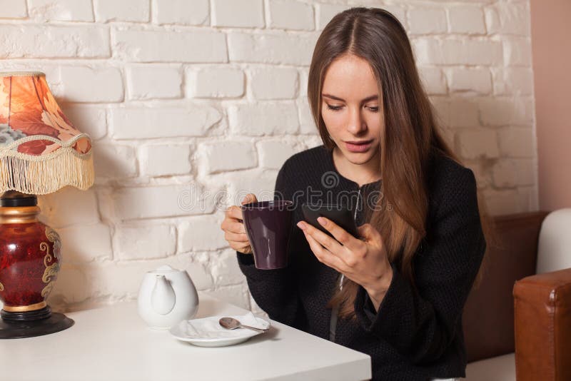 Woman with Tea and Smartphone Stock Photo - Image of beverage ...