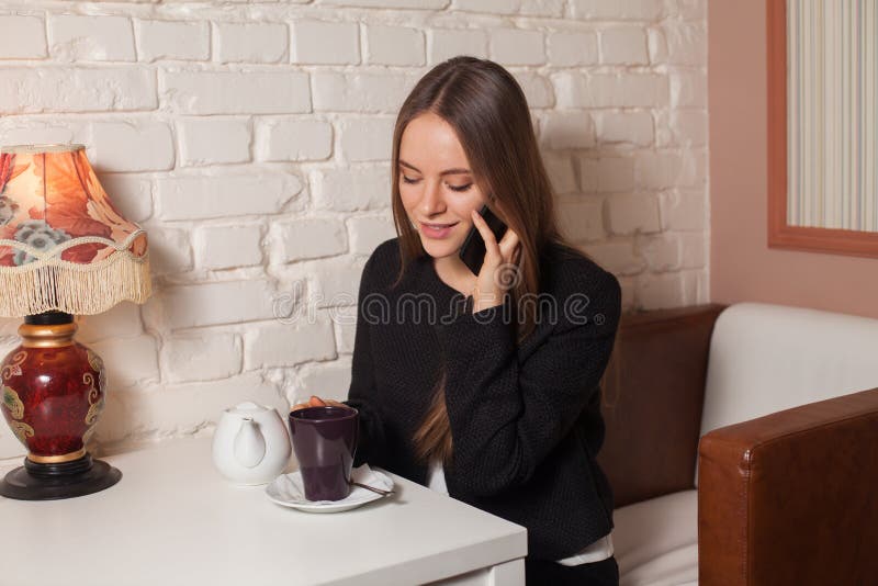 Woman with Tea and Smartphone Stock Image - Image of casual, coffee ...